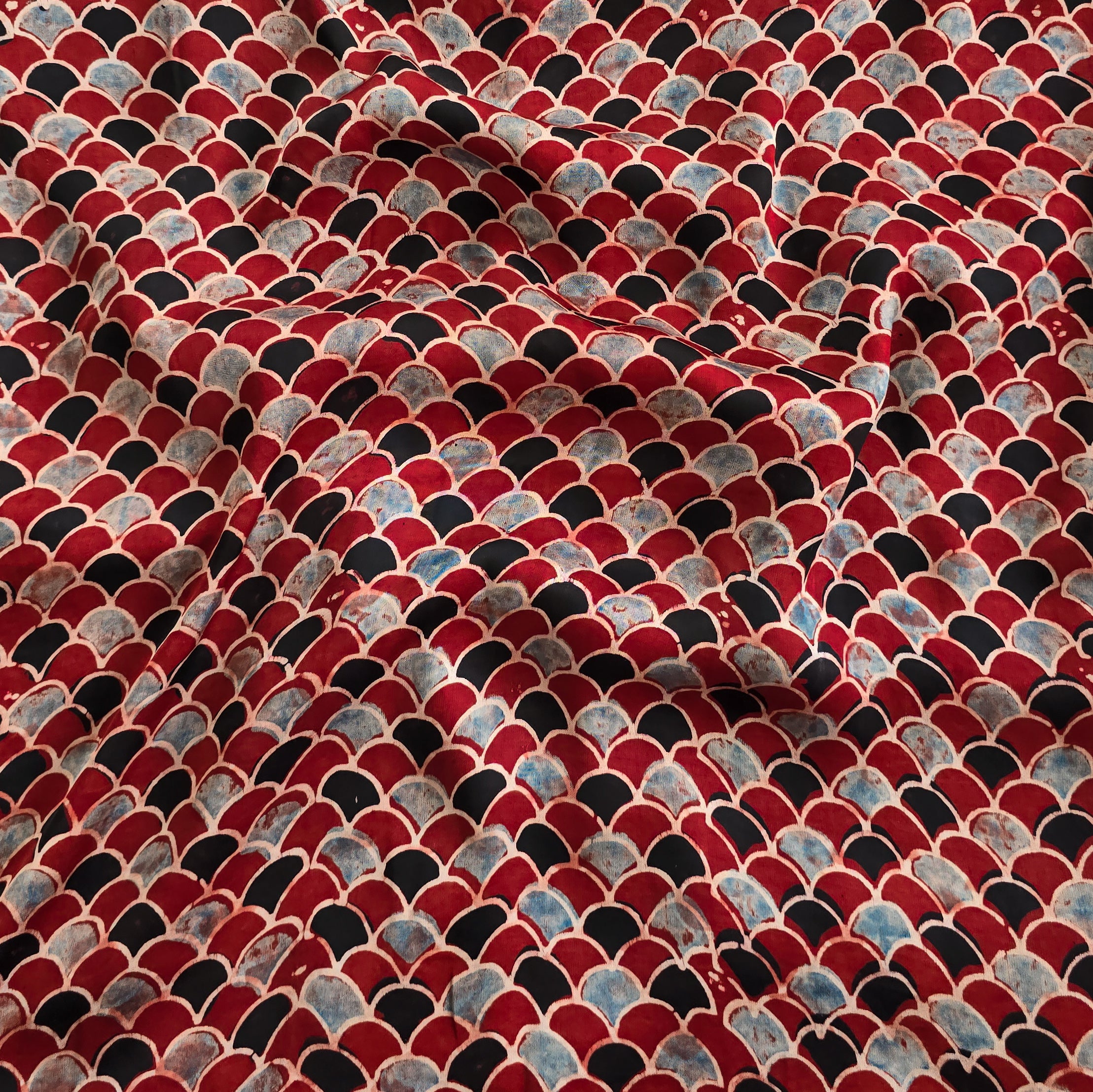 Modal Silk Rust Red With Rust Blue And Black Shell Motif Fabric – Sanskruti