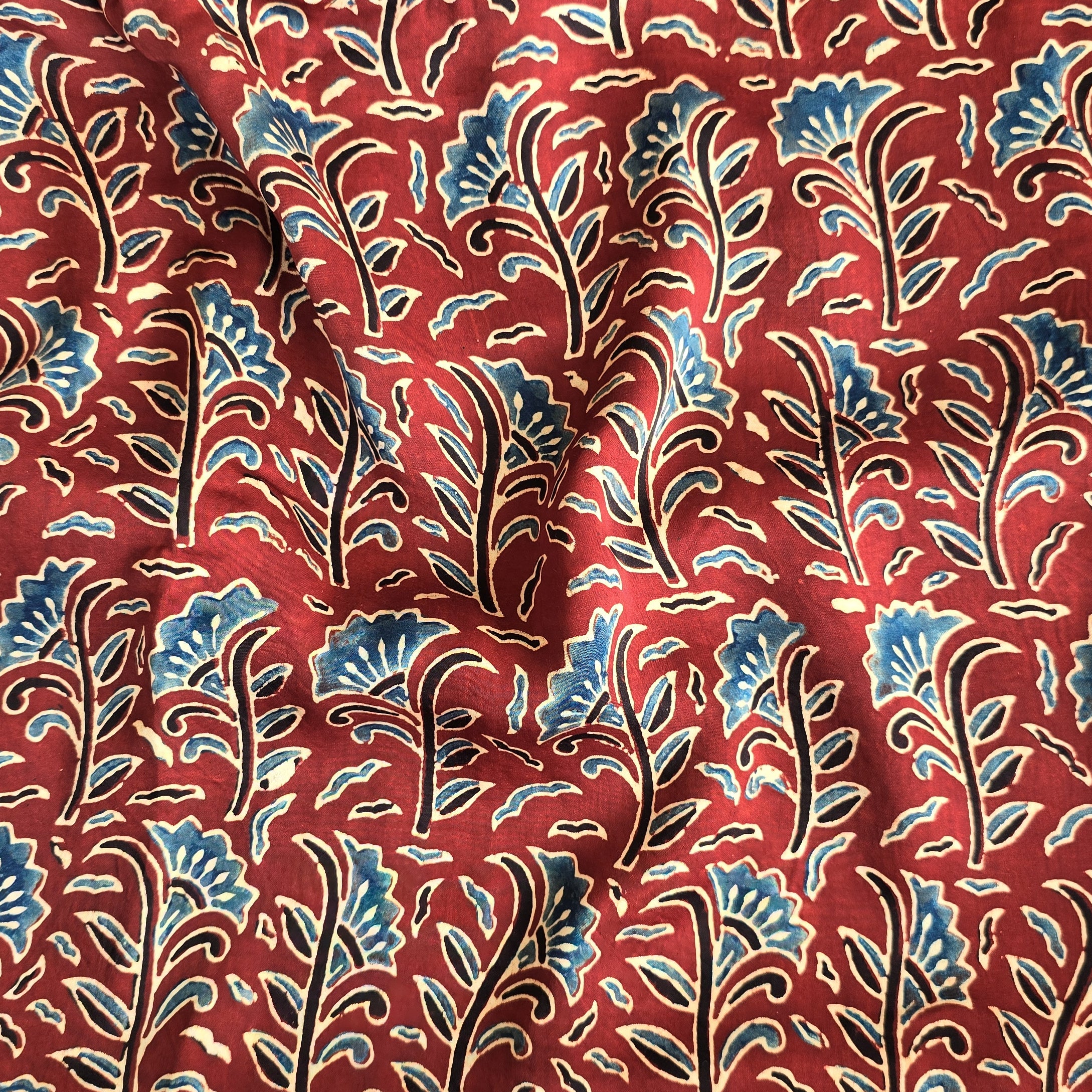 Modal Silk Rust Red With Blue Flower Motif Fabric – Sanskruti