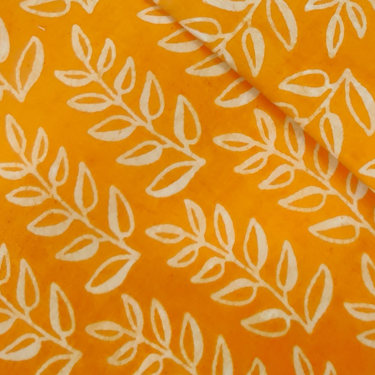 Pure Cotton Dabu Drak Orange With Cream Intricate Leaves Motifs Hand B – Sanskruti