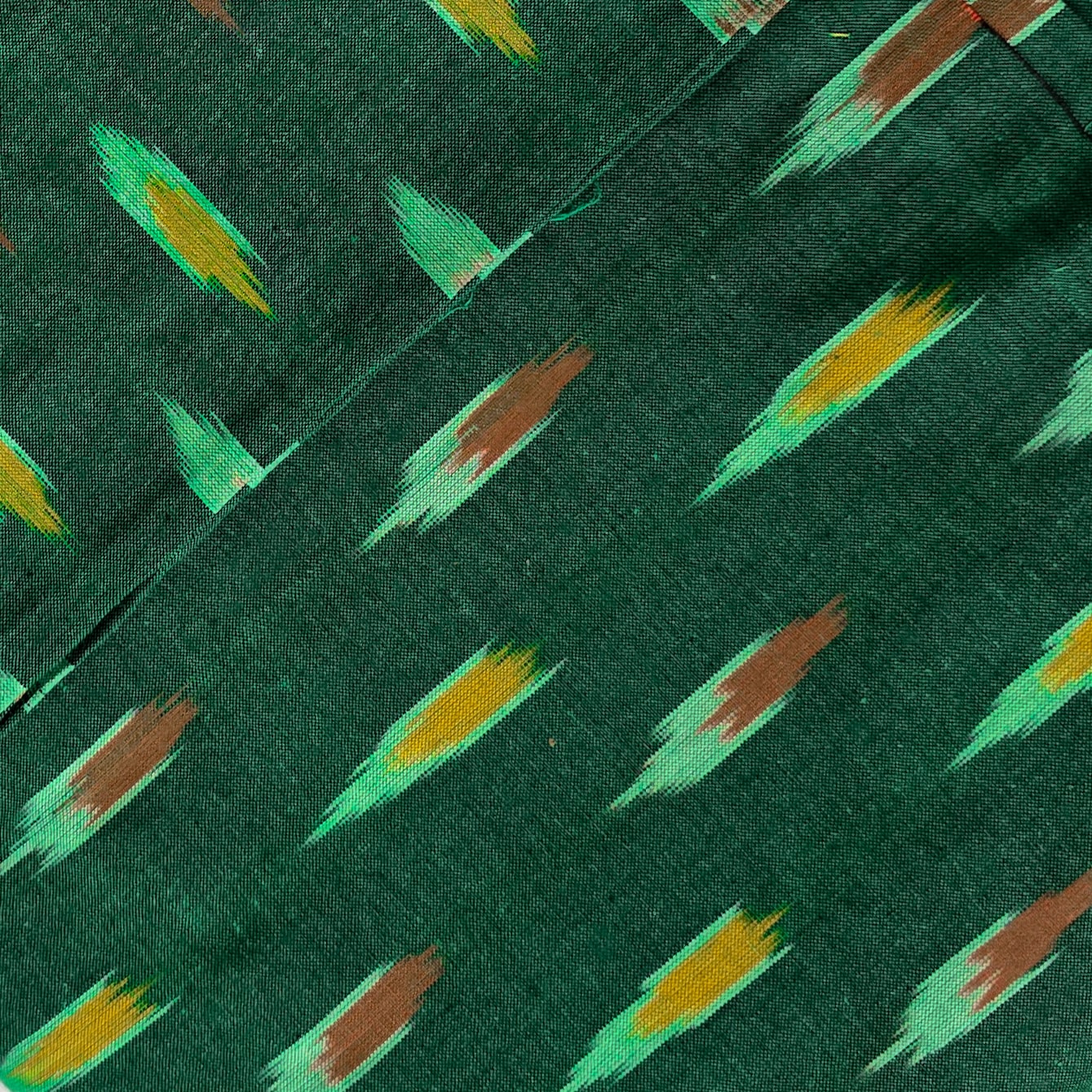 Pure Cotton Ikkat Green With Yellow Red Distorted Woven Fabric – Sanskruti
